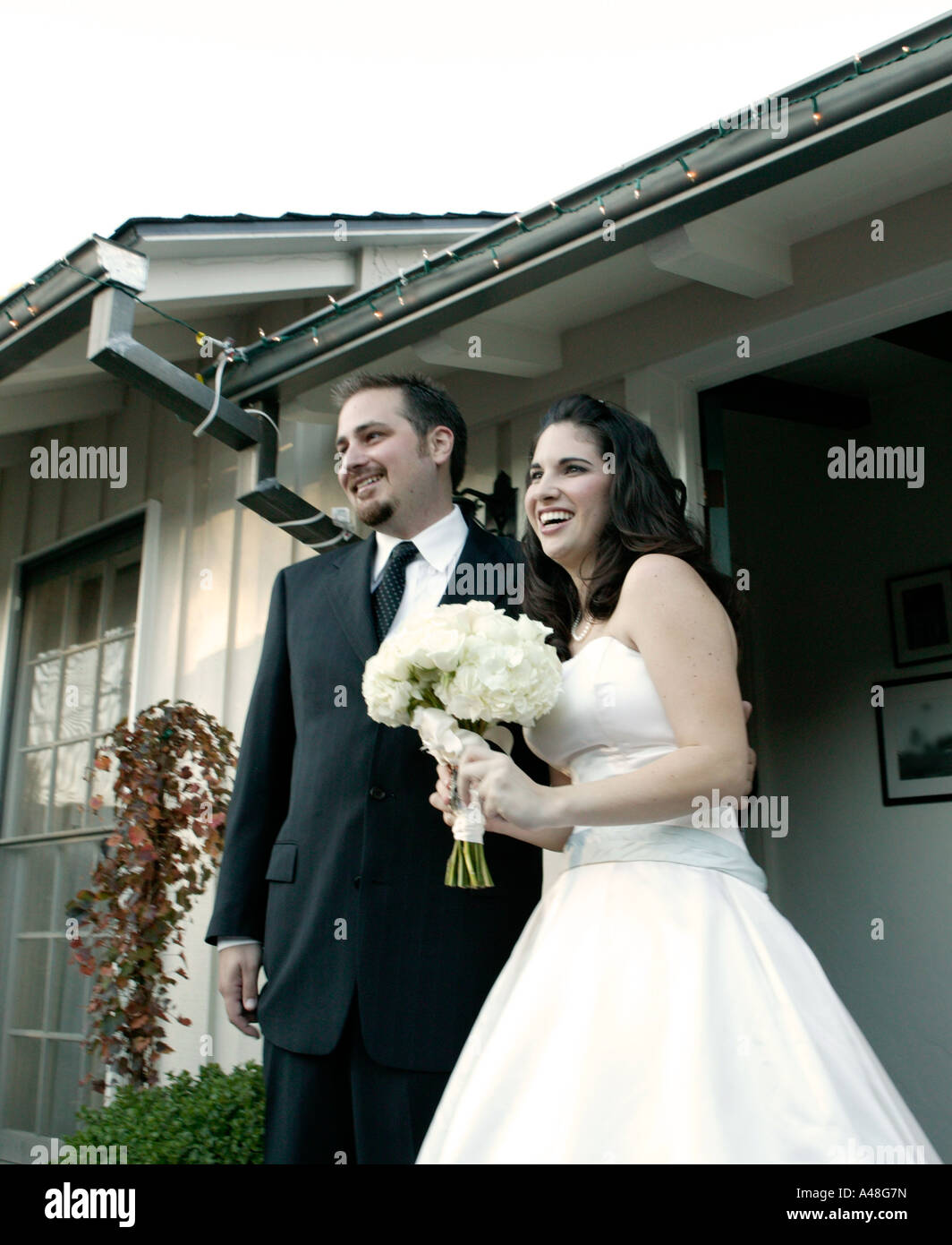 Married couple smiling Stock Photo - Alamy