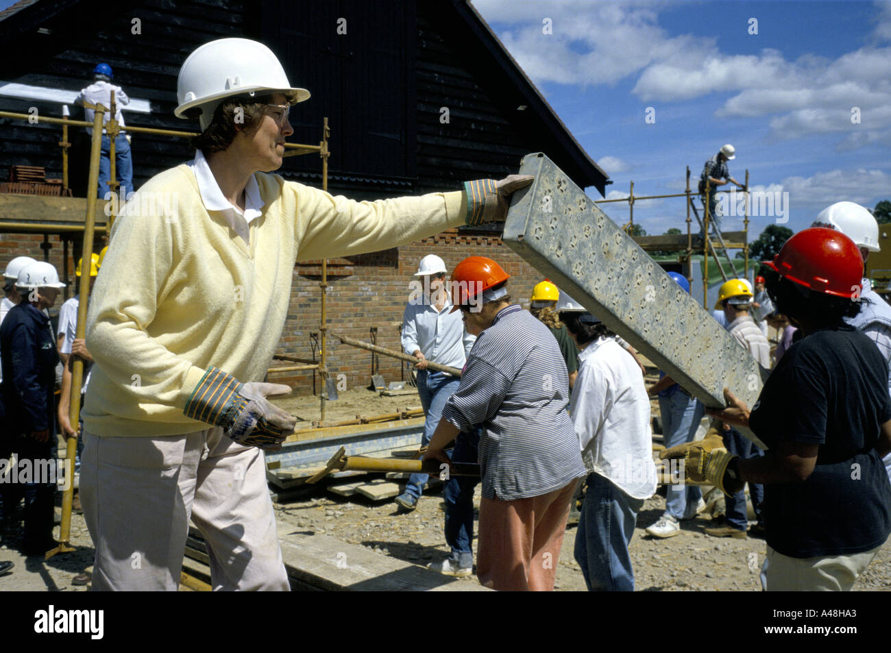 jehovah s witnesses in safety helmets building the new kingdom hall in ...