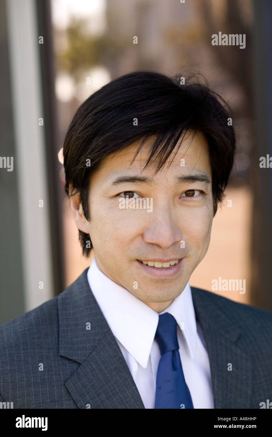 Businessman smiling, portrait Stock Photo - Alamy