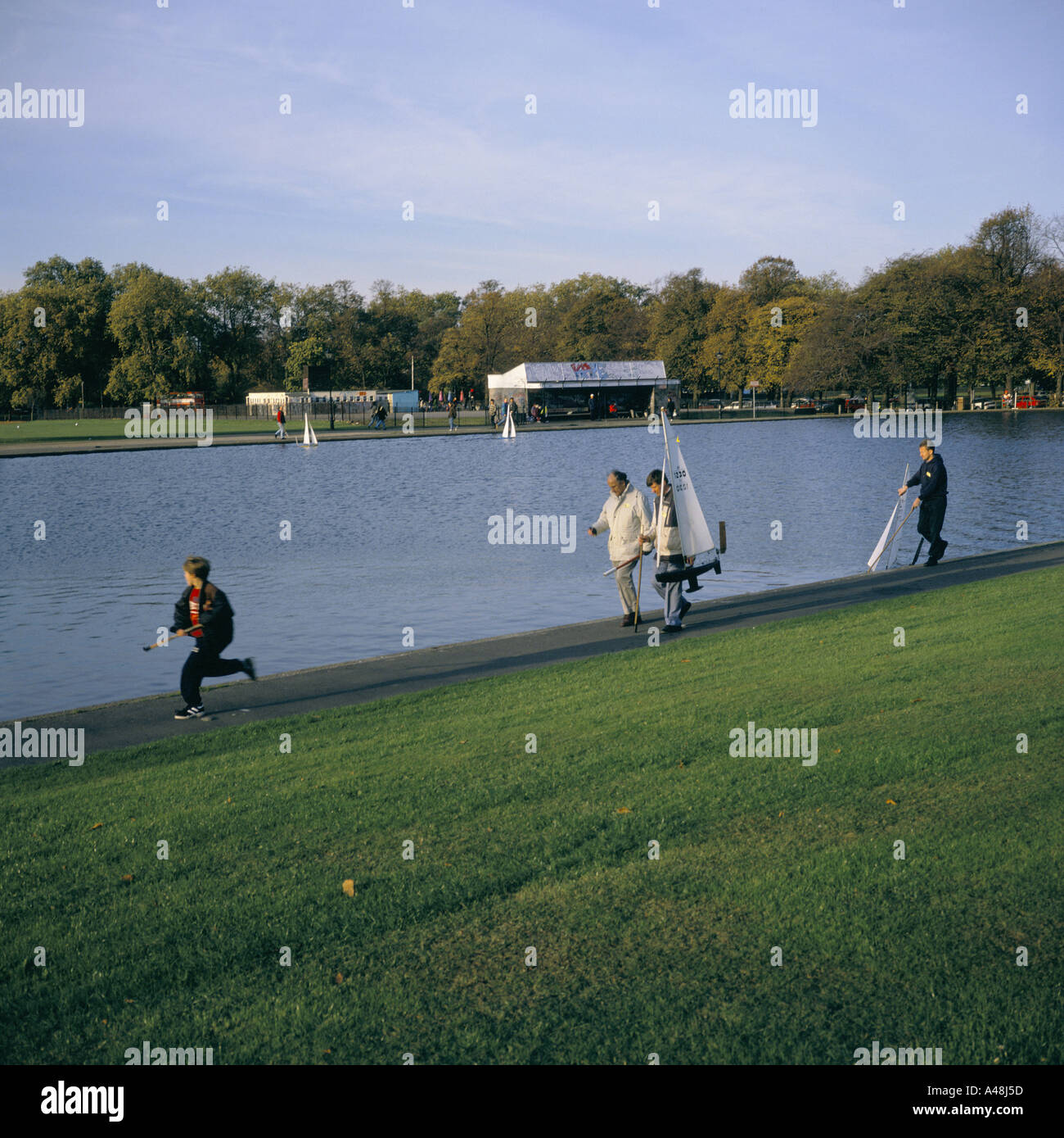 Boys with toy boat hi-res stock photography and images - Alamy