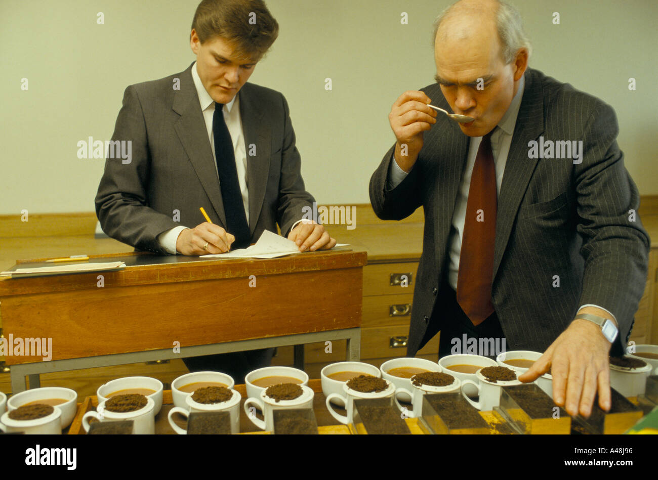 Tea tasting at a tea importers to select which tea to buy Stock Photo ...