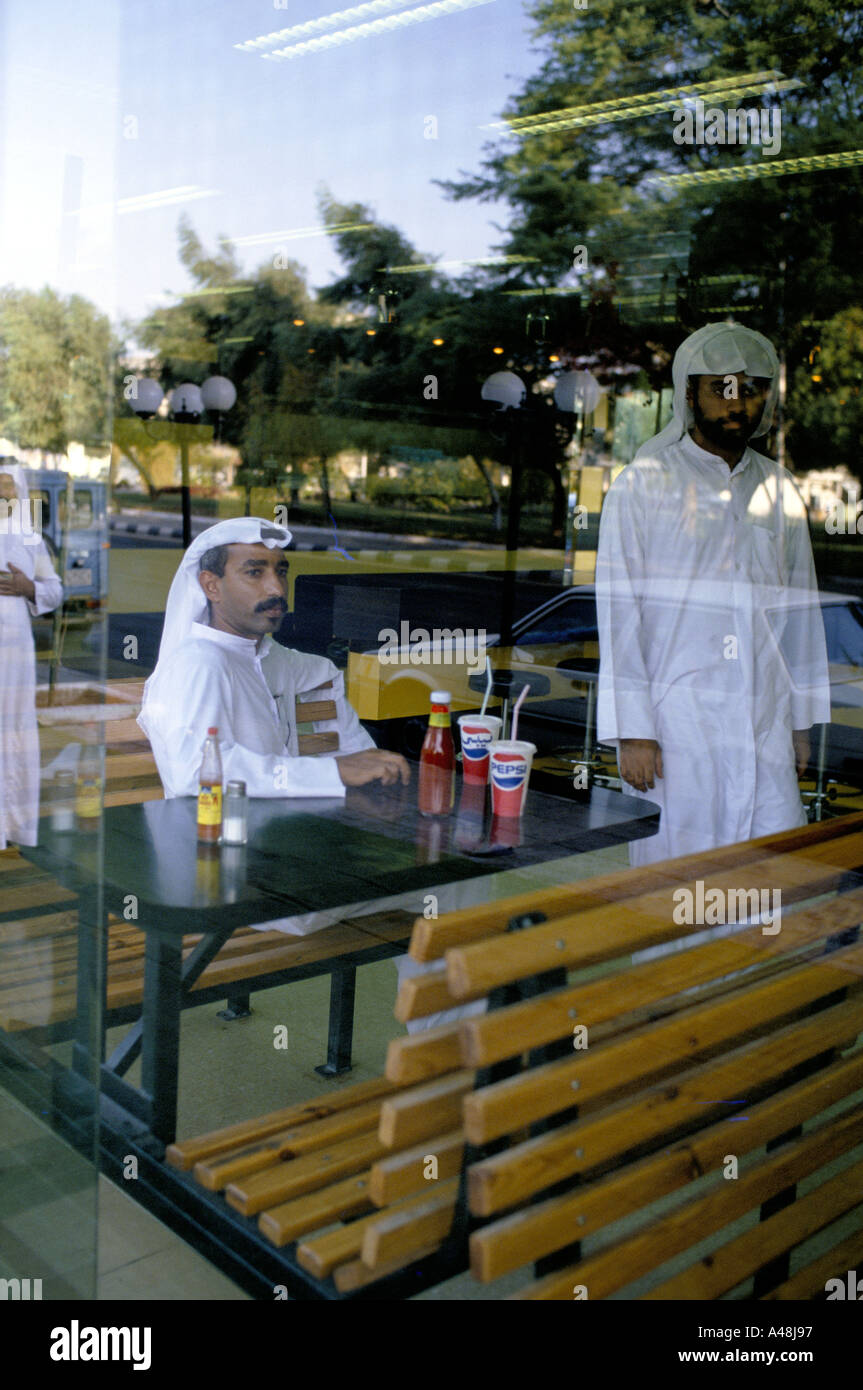 arab men drinking pepsi in cafe in dharan saudi arabia Stock Photo - Alamy