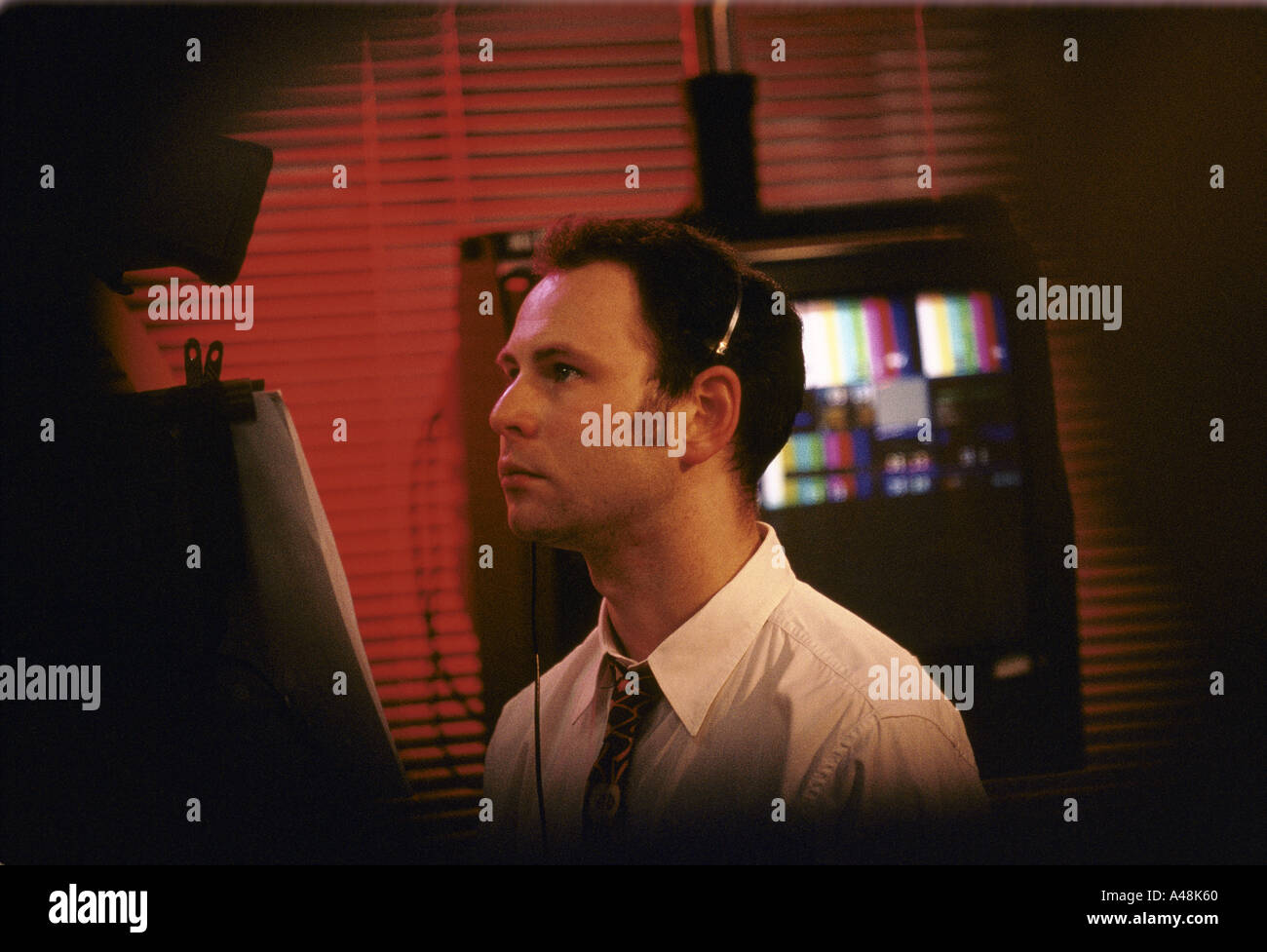 camerman filming channel 5 newsroom tv studio Stock Photo - Alamy