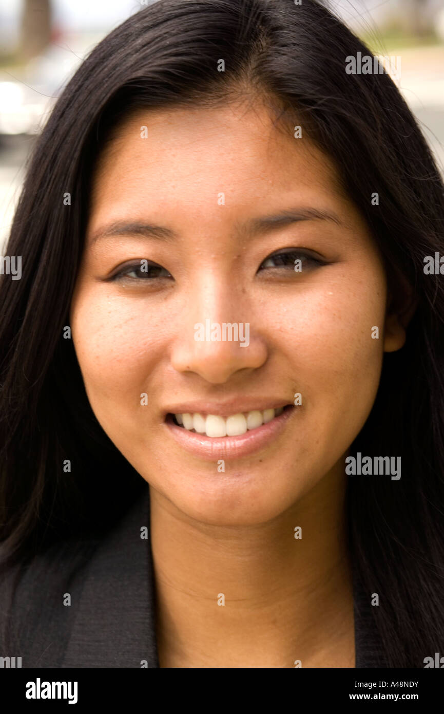 Young woman smiling, portrait Stock Photo - Alamy