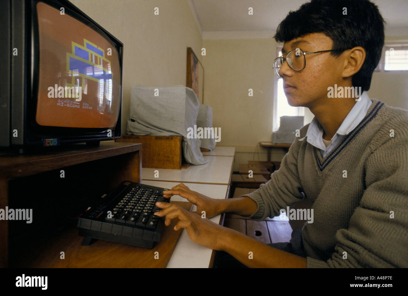Nepalese children working on computers in a private school in Katmandu ...