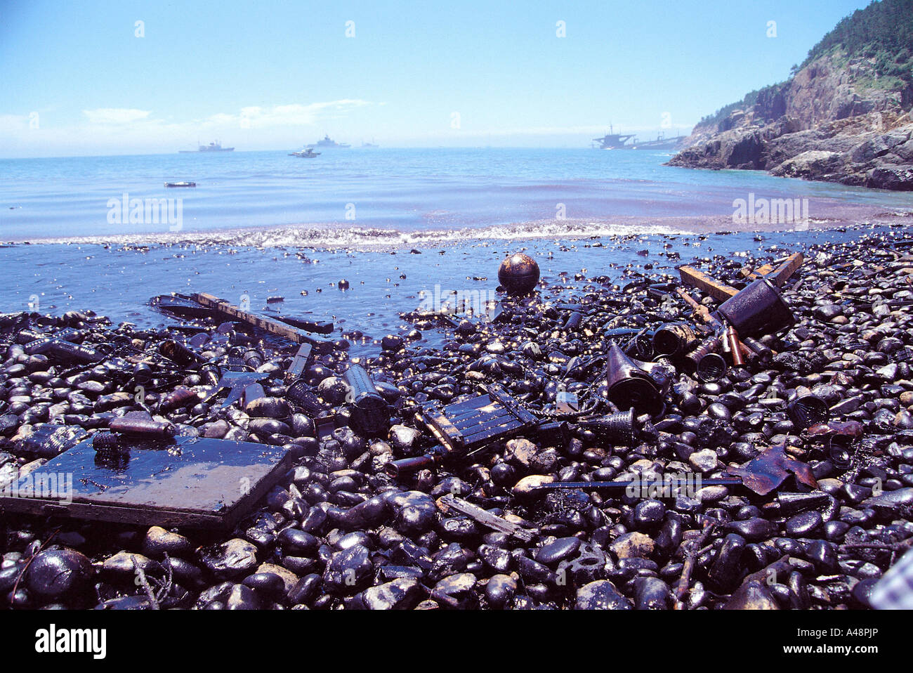 Garbage on the beach Stock Photo - Alamy