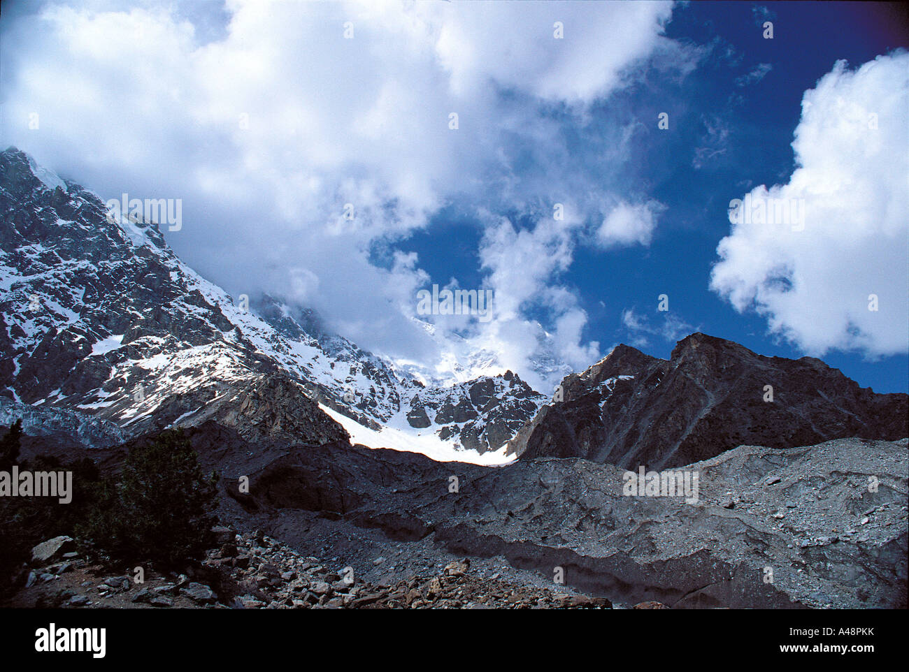 Clouds over mountains Stock Photo - Alamy