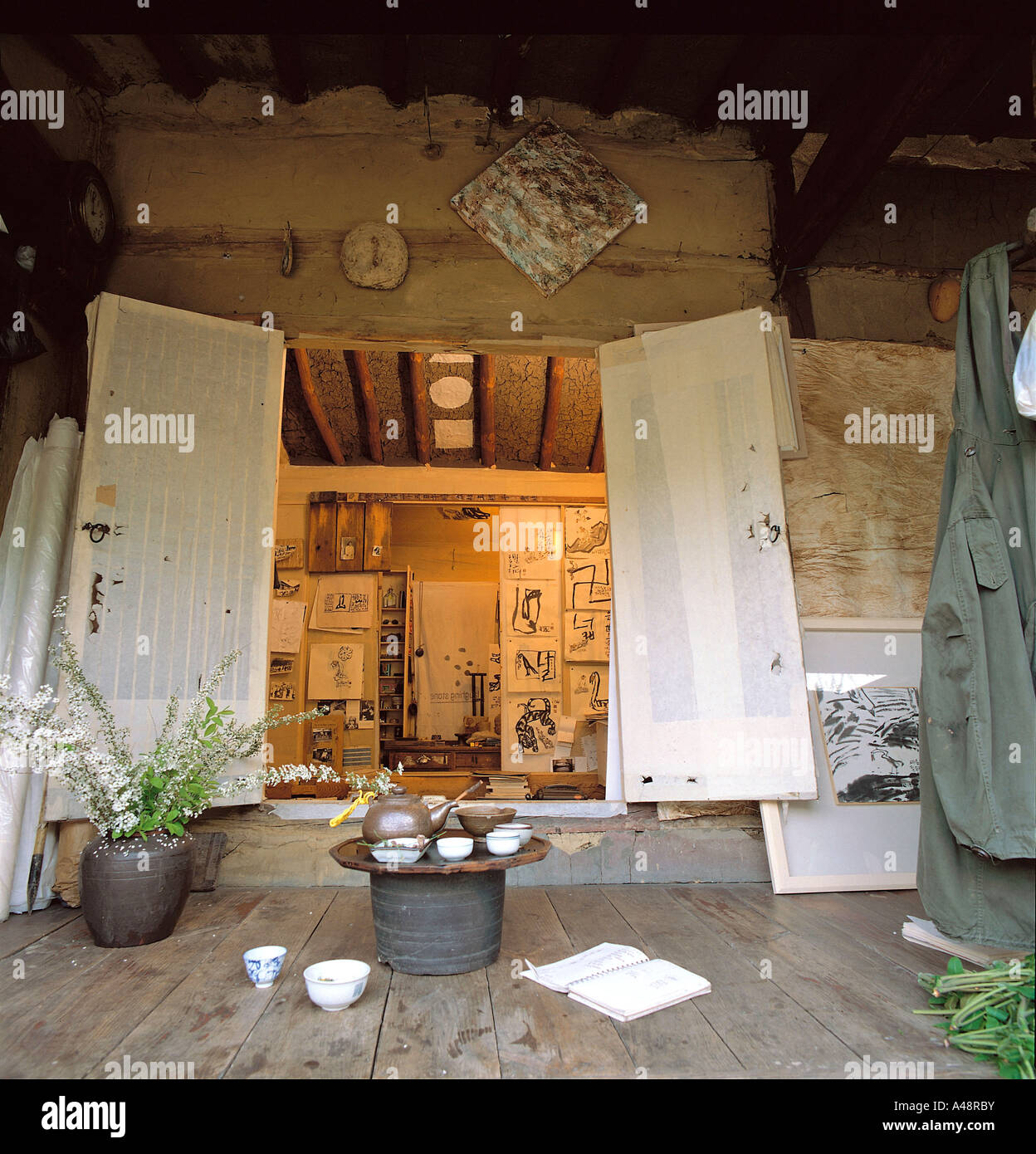 Open door of a house Stock Photo - Alamy