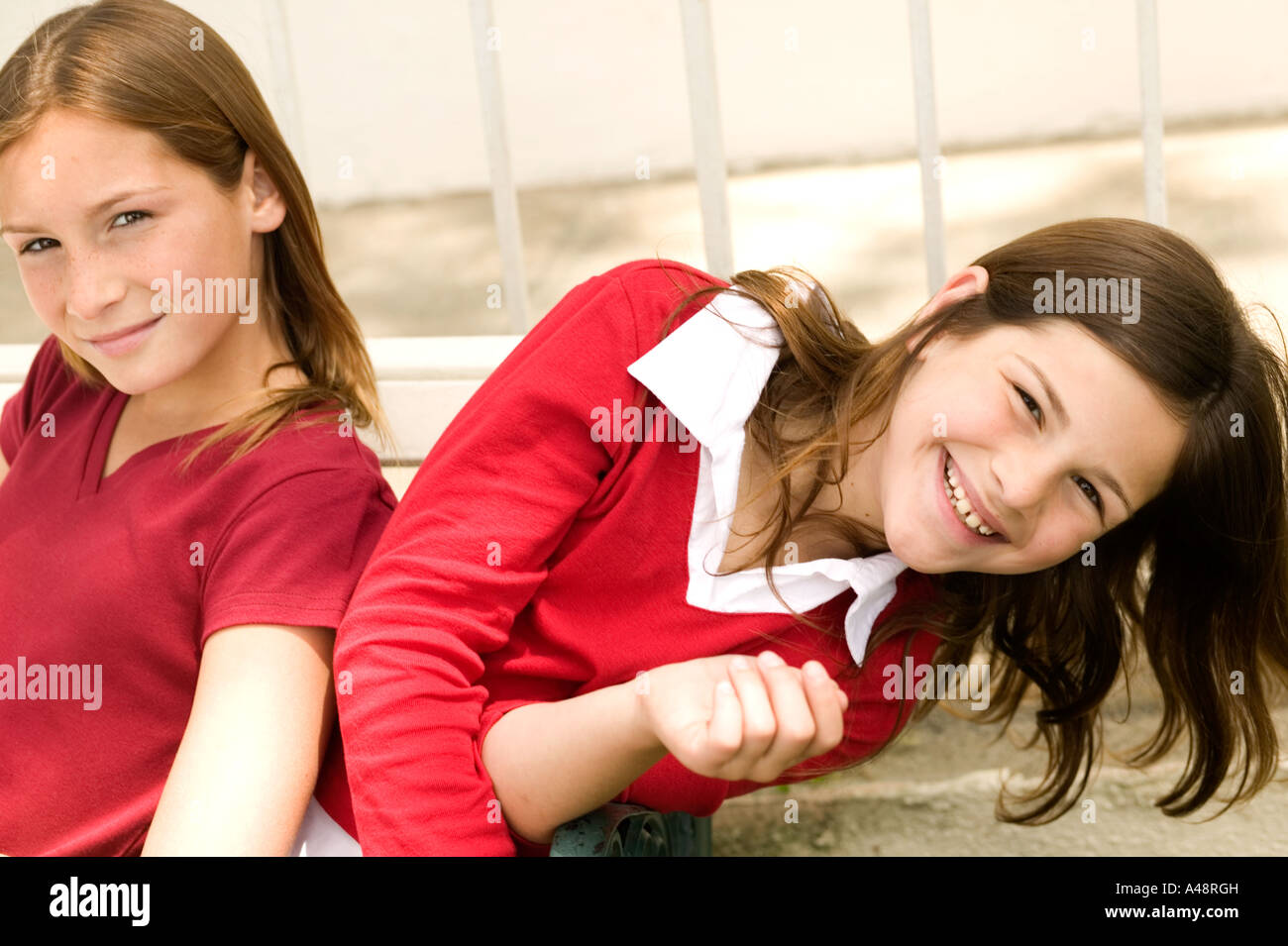 Sisters smiling, portrait Stock Photo - Alamy
