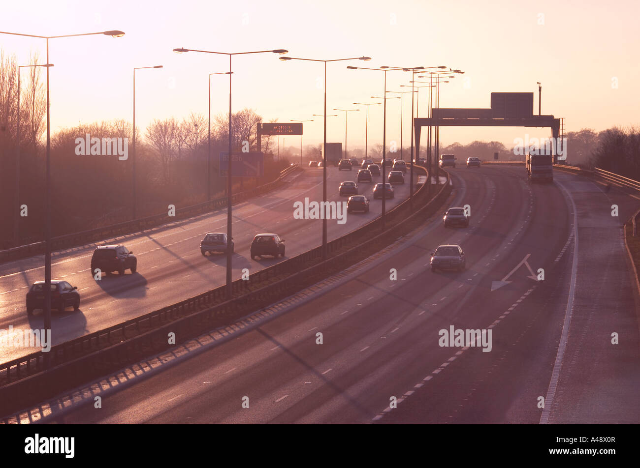 M6 motorway at Preston, Lancashire, UK, at sunset. This was the first ...