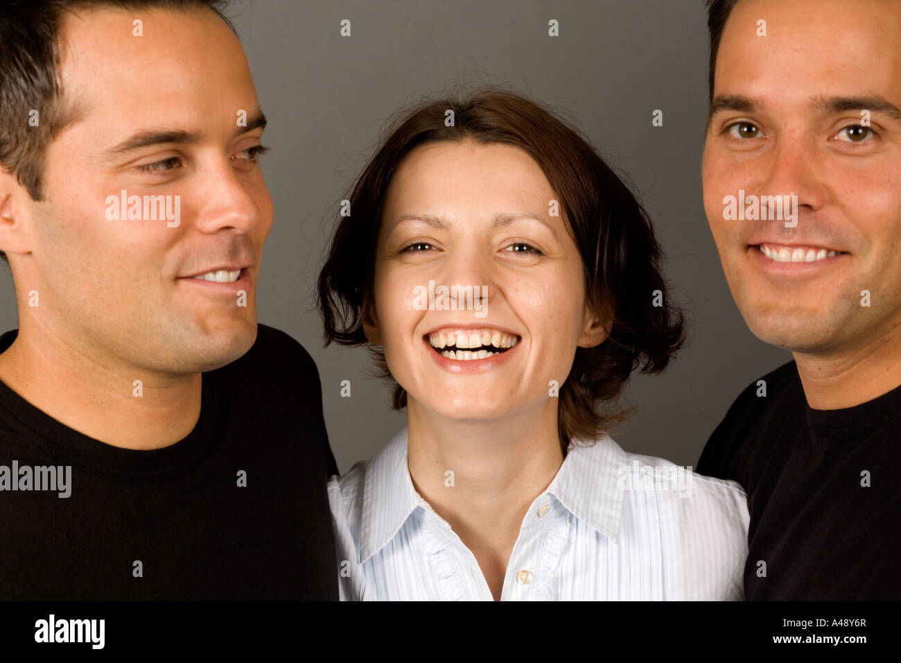 Men and woman smiling, portrait Stock Photo - Alamy