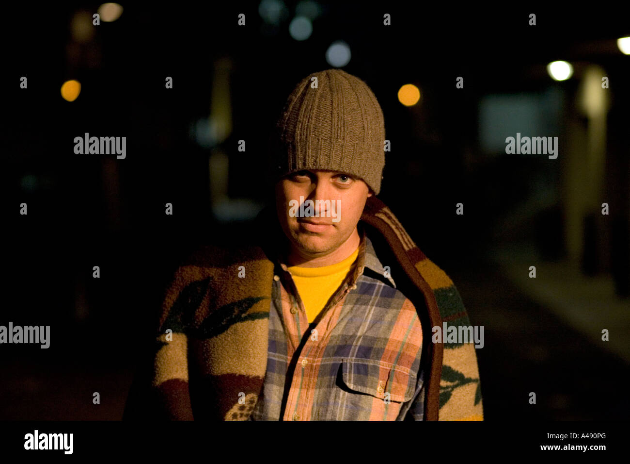 Young man wearing skull cap, portrait Stock Photo - Alamy