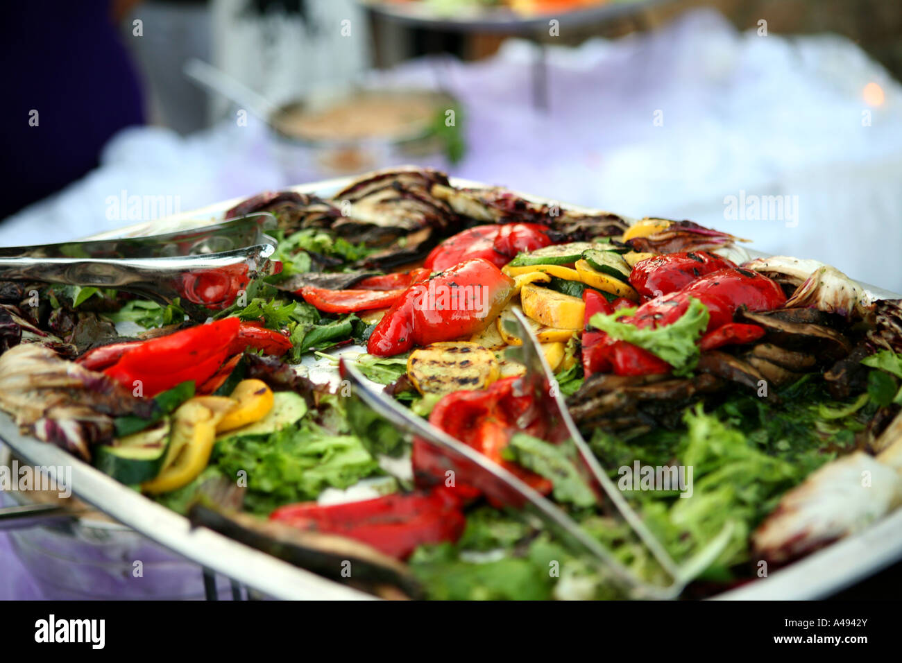 Metal salad tongs hi-res stock photography and images - Alamy