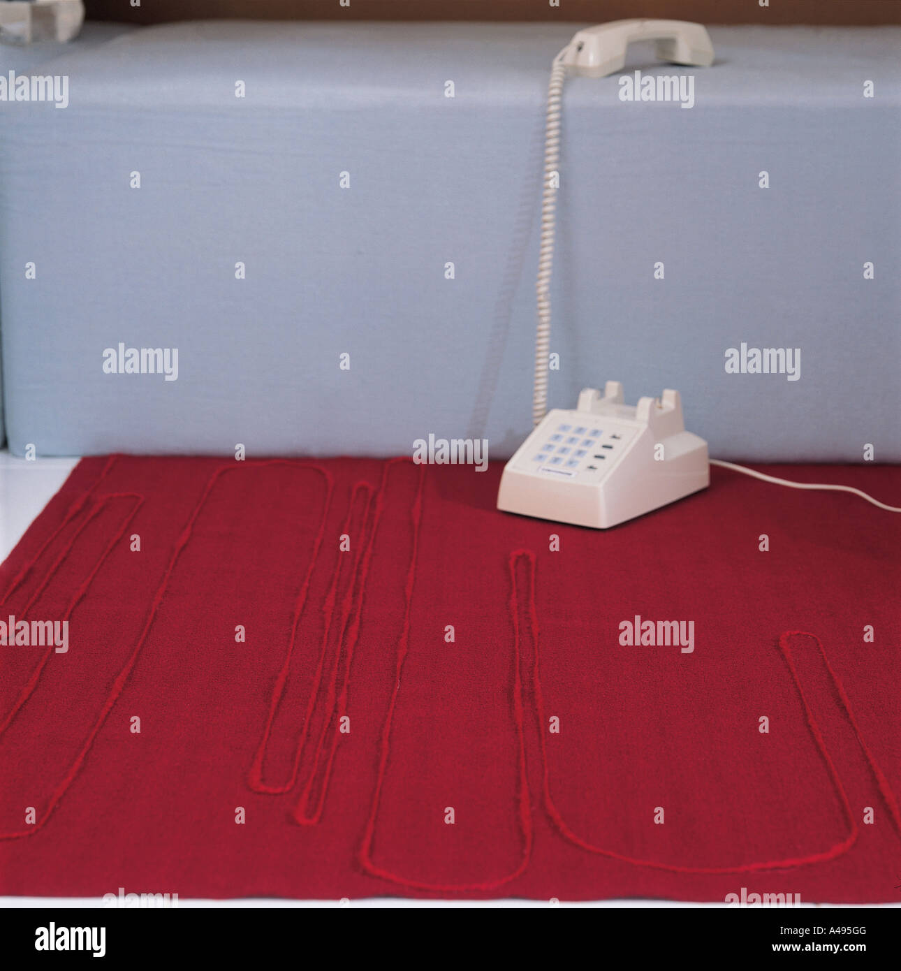 Telephone on a mat Stock Photo - Alamy
