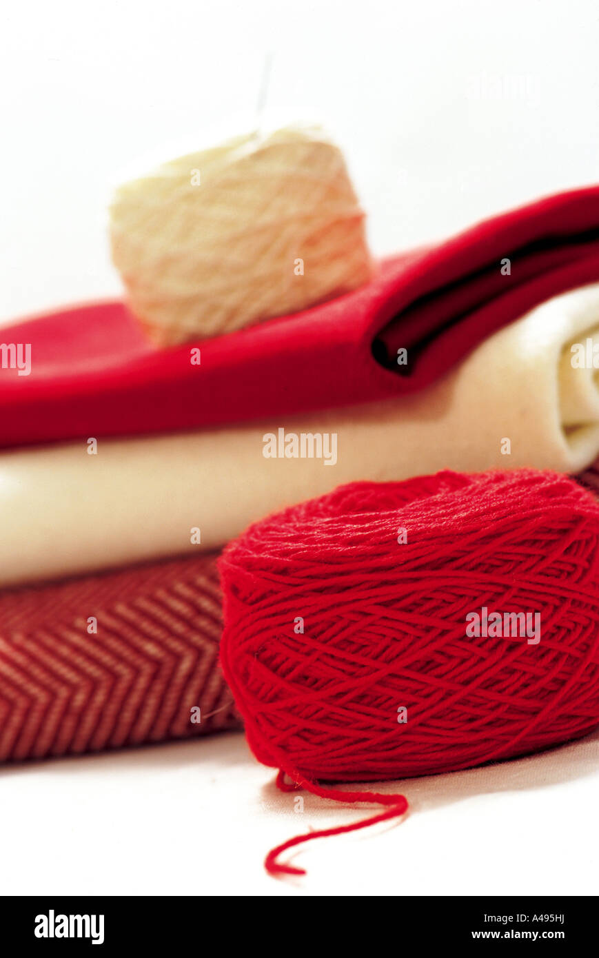 Close-up of a ball of wool with fabric Stock Photo - Alamy