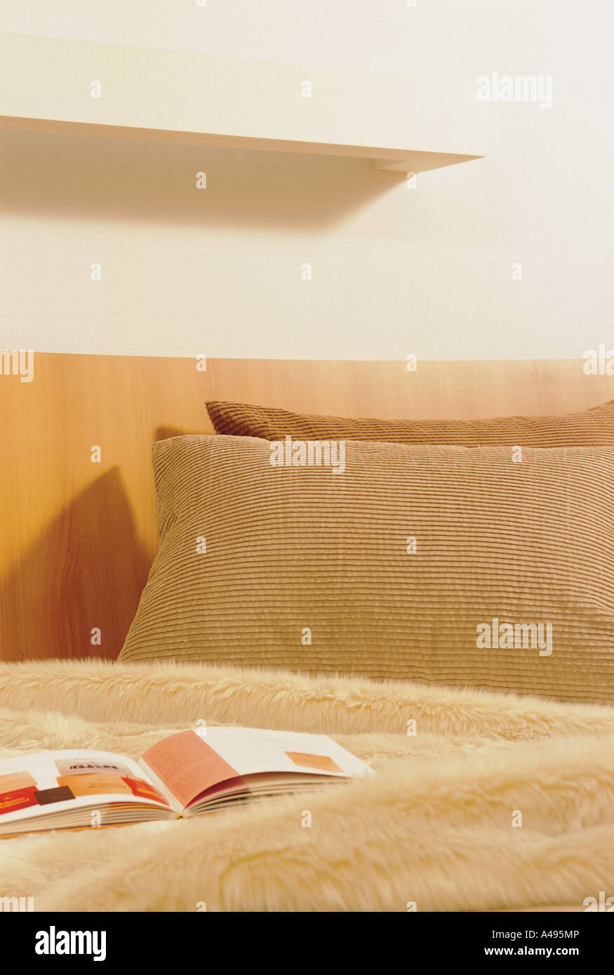High angle view of an open magazine on the bed Stock Photo - Alamy
