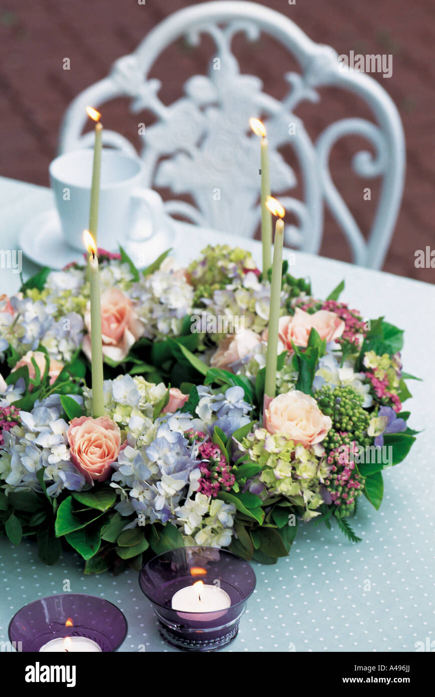 High angle view of lit candles on the dining table Stock Photo - Alamy