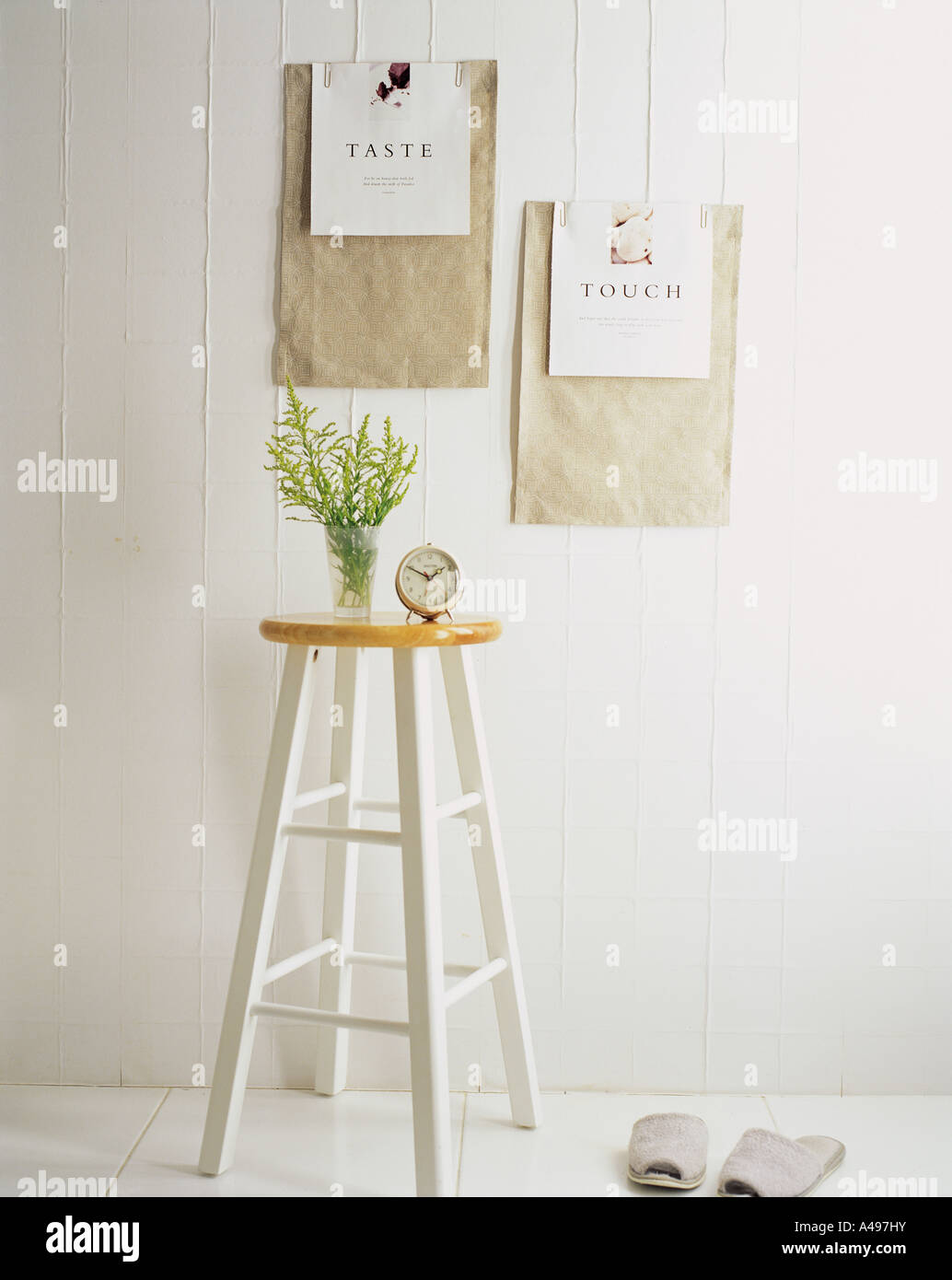 Paper hanging on the wall in a room Stock Photo - Alamy