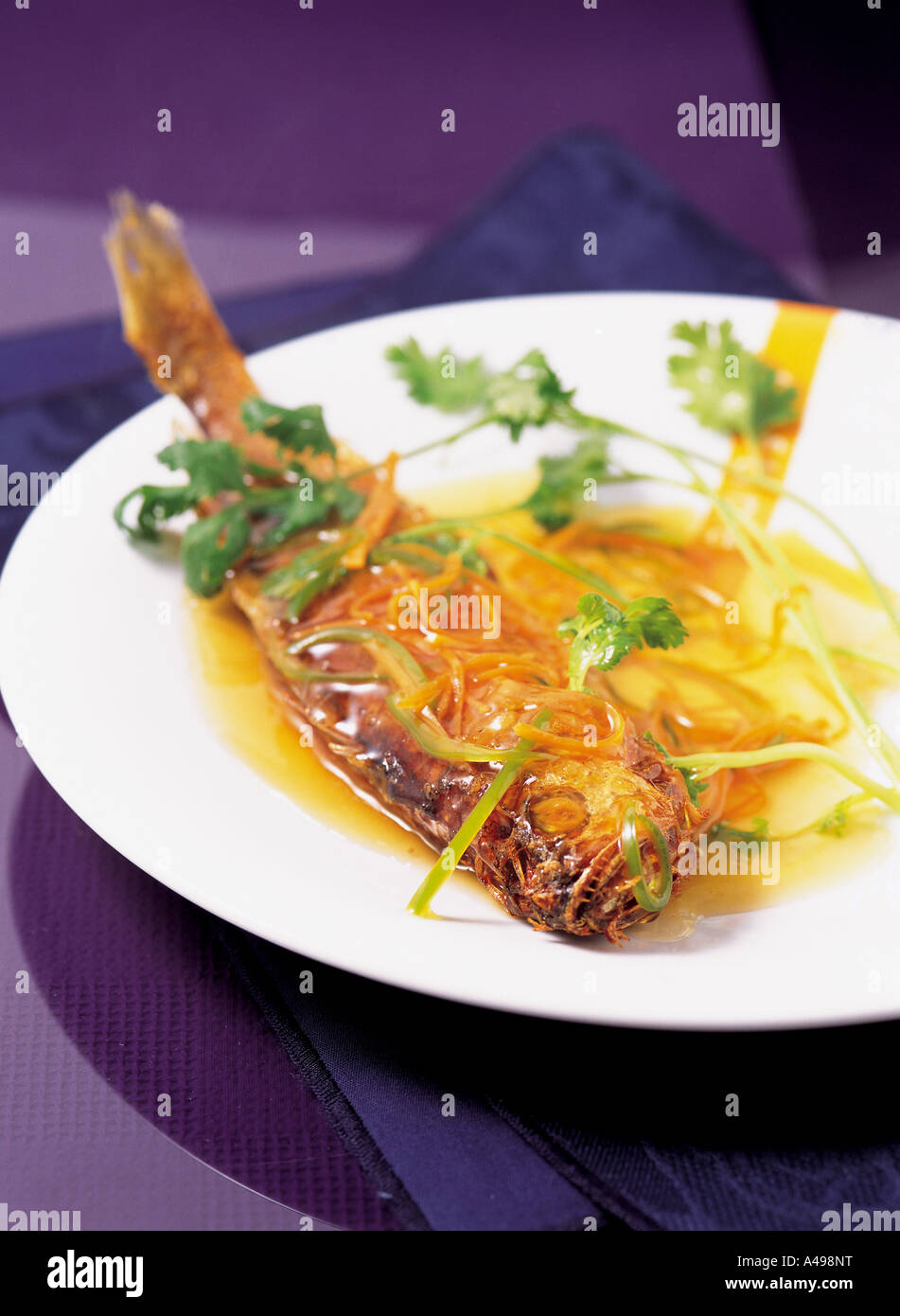 High angle view of sauteed fish Stock Photo - Alamy