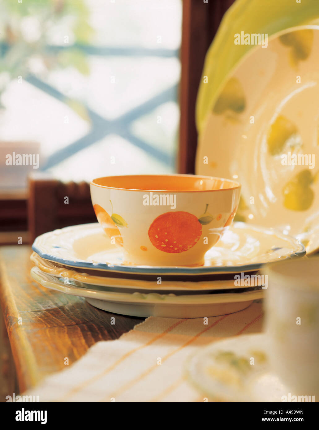 Plates together vertical hi-res stock photography and images - Alamy