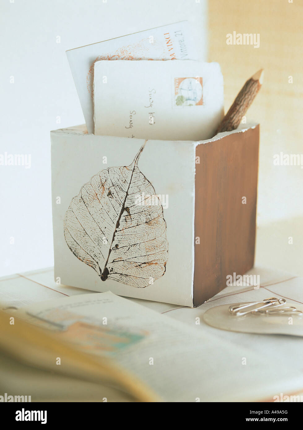 Close-up of two letters in a box Stock Photo - Alamy