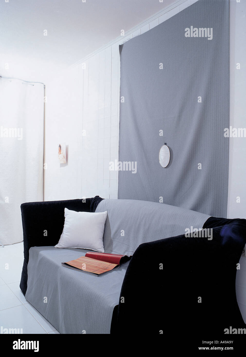 Empty couch in the living room Stock Photo - Alamy