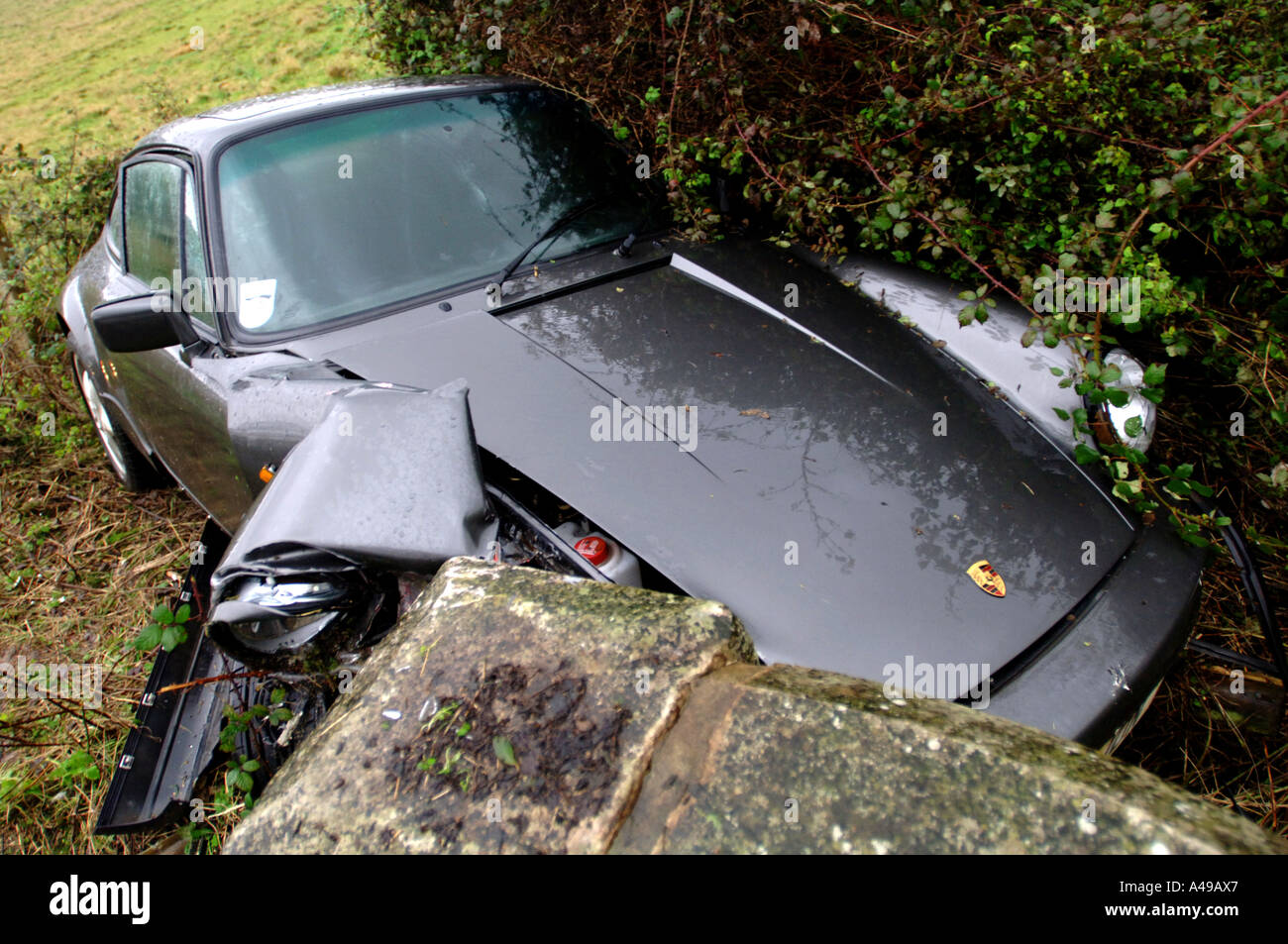 Crashed Porche car in the UK Stock Photo - Alamy