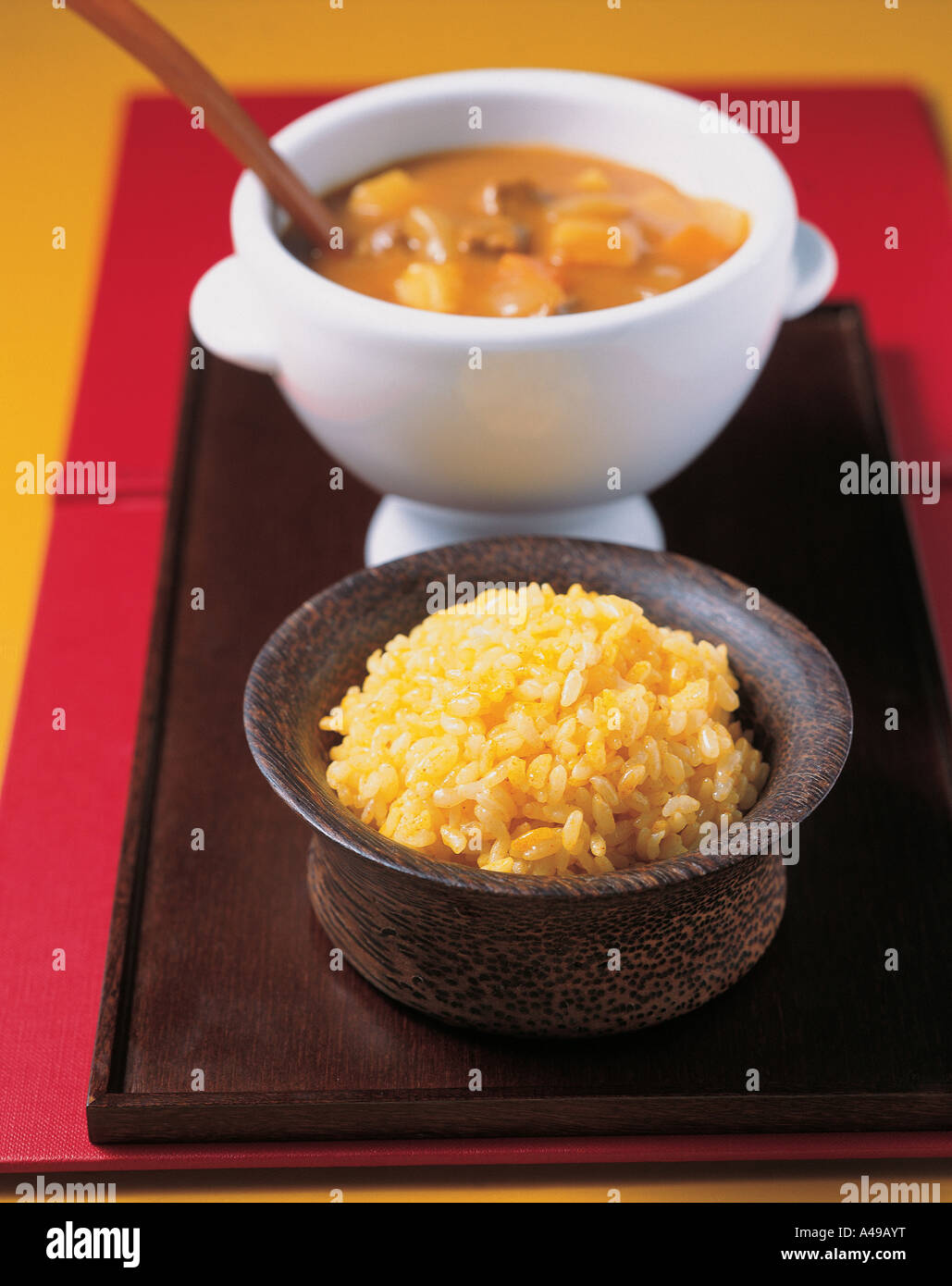 High angle view of rice and curry in bowls Stock Photo - Alamy