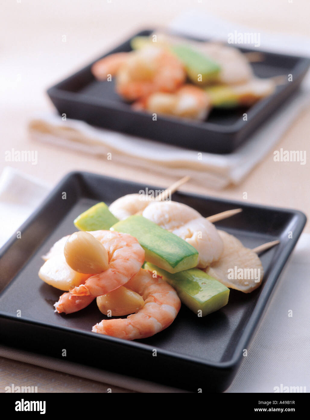 High angle view of prawns and sliced fish Stock Photo - Alamy
