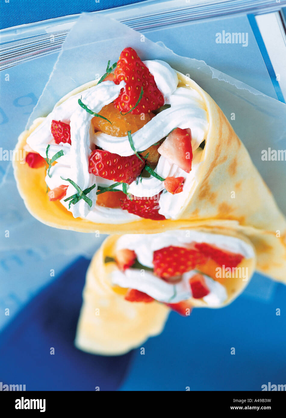 Close-up of strawberries and cream wraps Stock Photo - Alamy