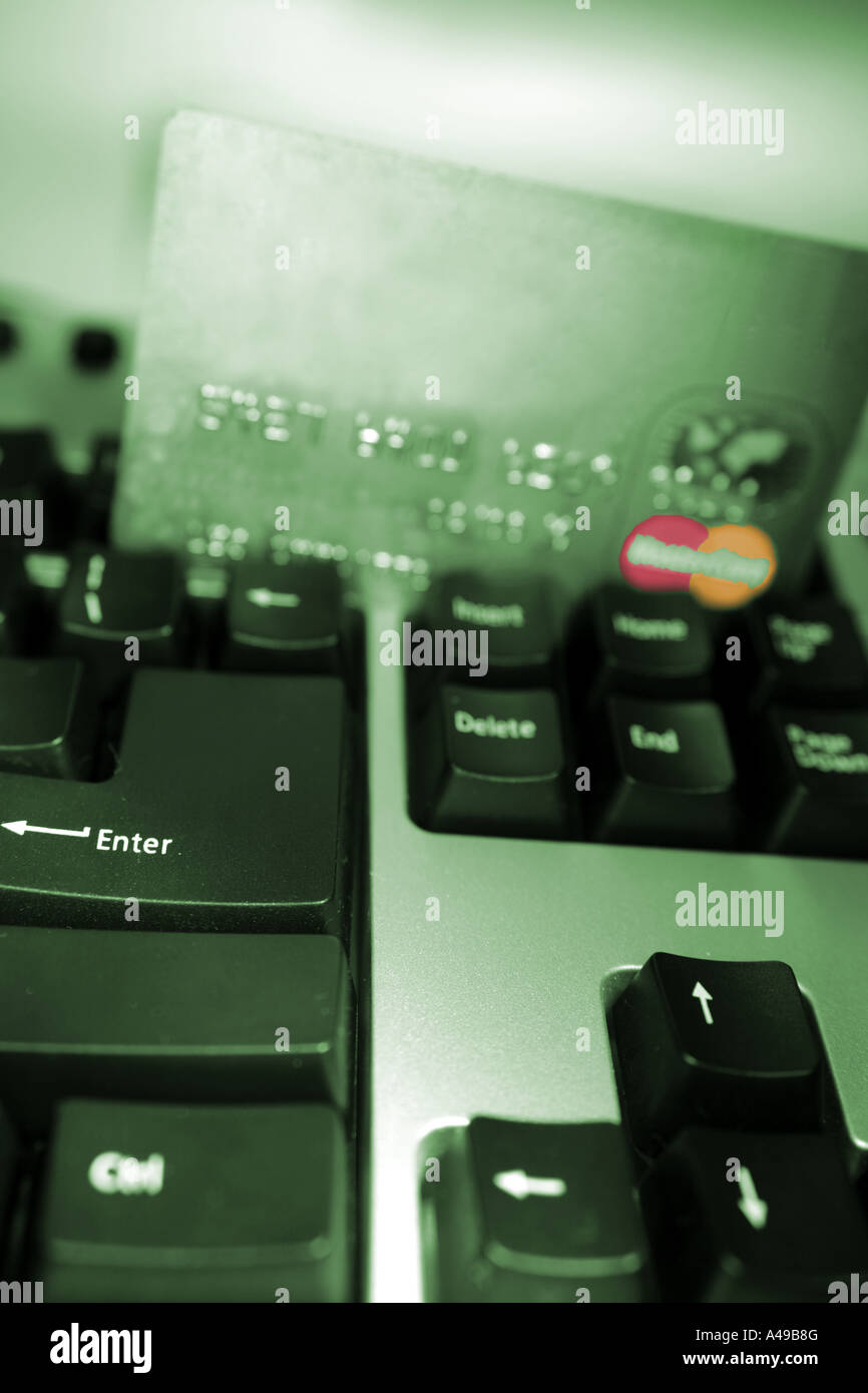 Credit card in keys of computer keyboard Stock Photo - Alamy