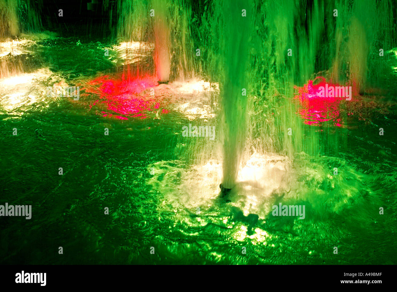 Fountain of colorful water Stock Photo - Alamy