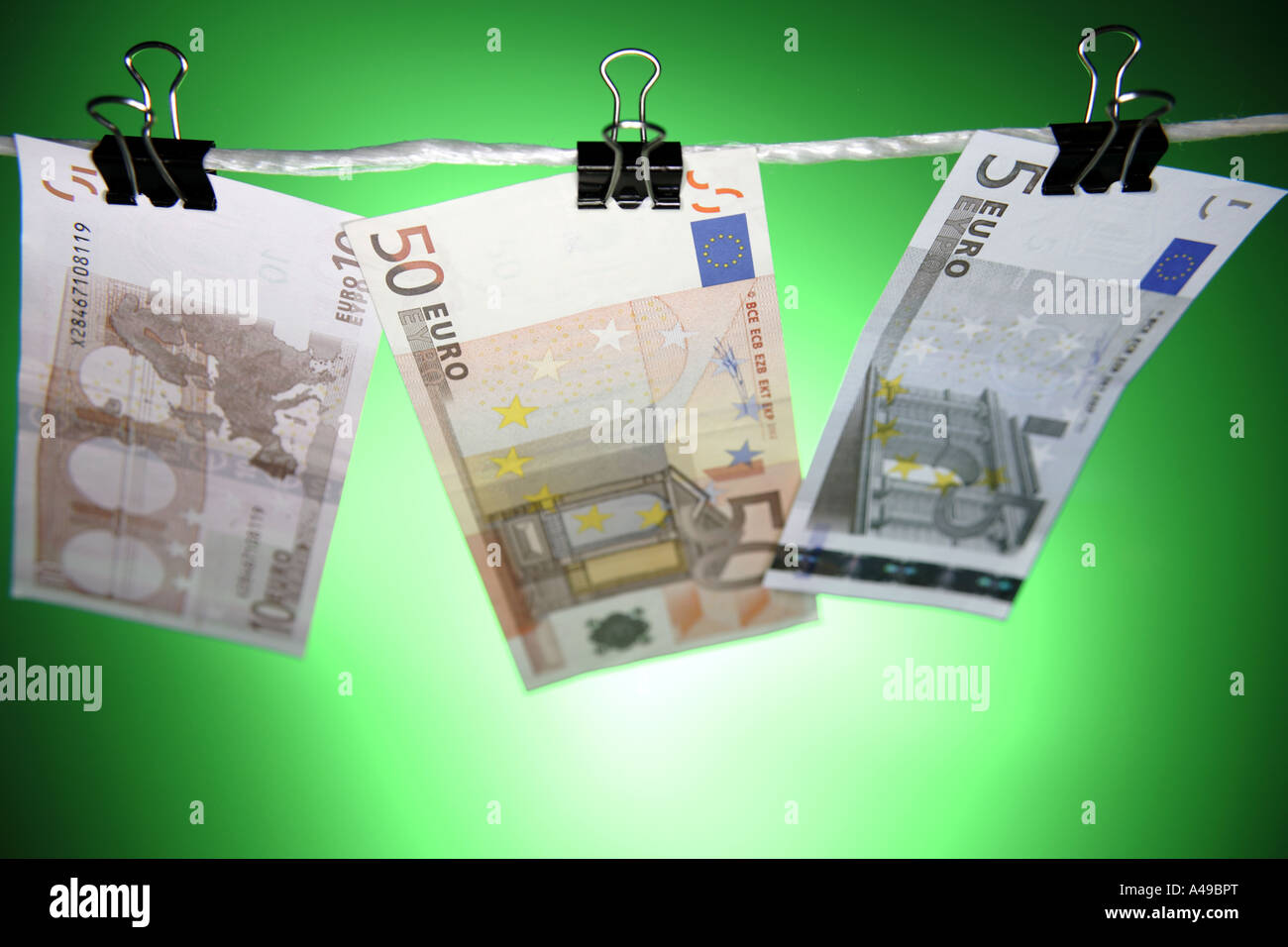 Money hanging on line Stock Photo - Alamy