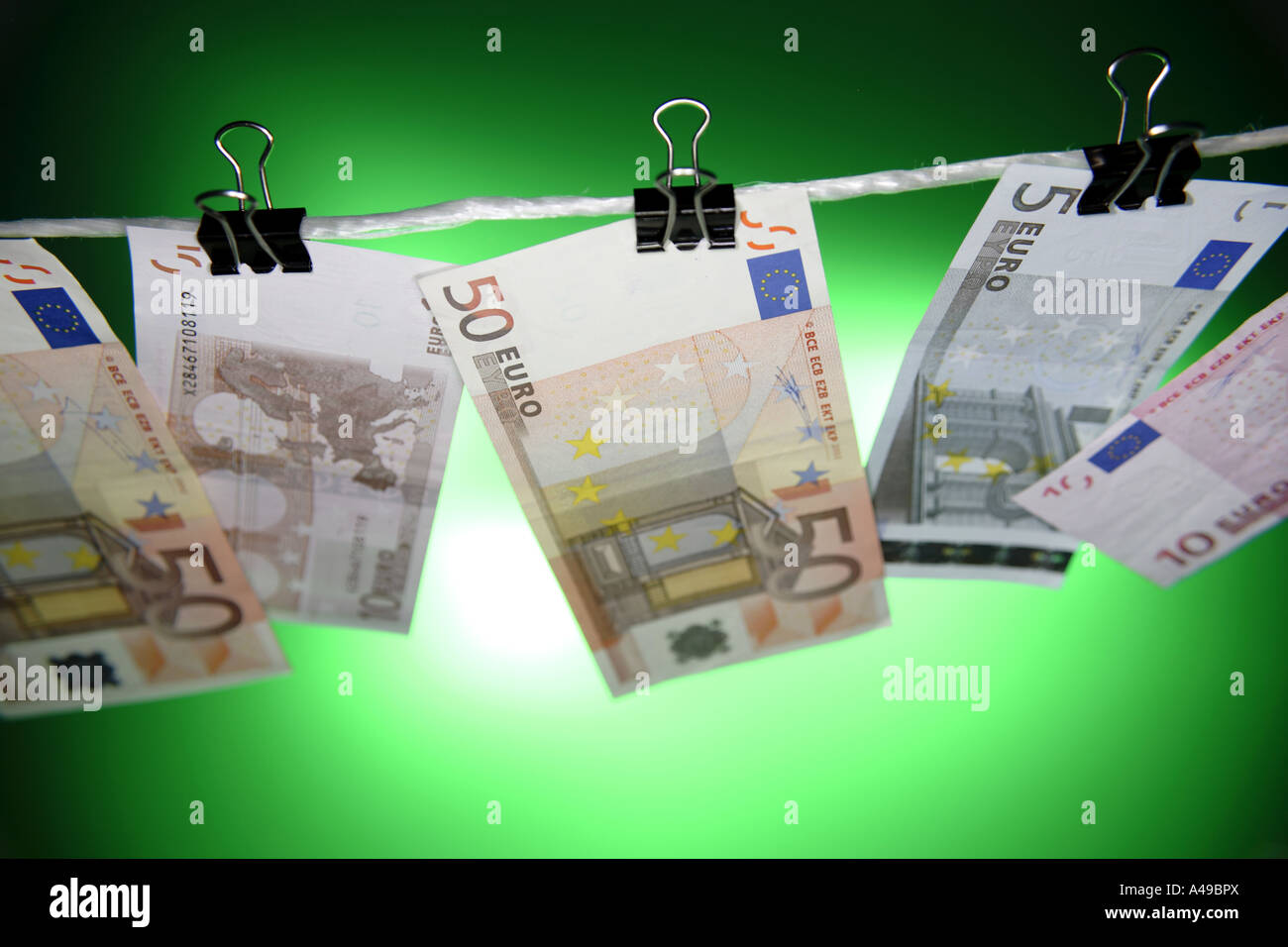 Money hanging on line Stock Photo - Alamy