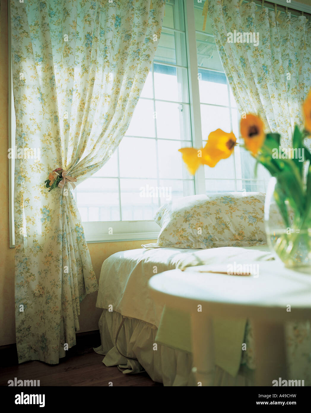 Close-up of a flower vase on a stool in the bedroom Stock Photo - Alamy