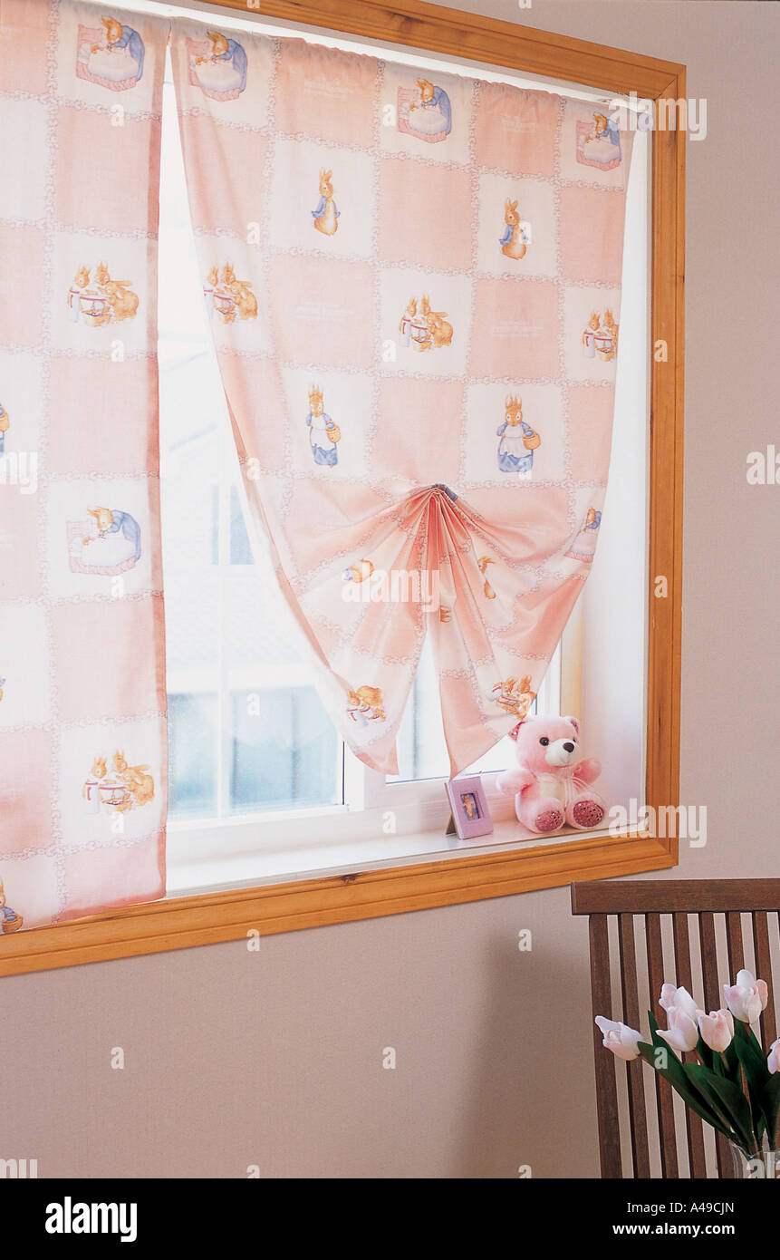Stuffed toys in front of a window Stock Photo - Alamy