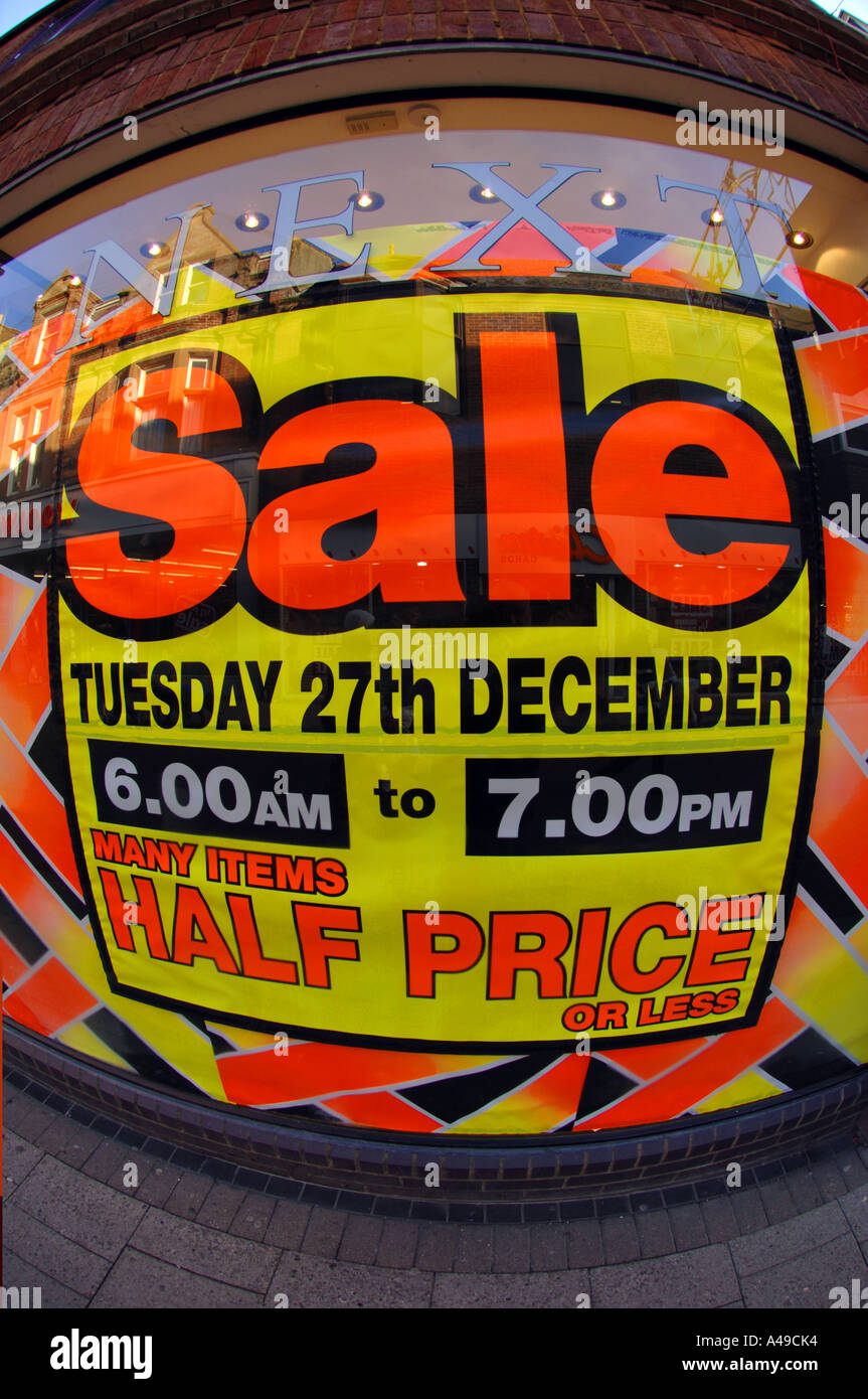 Sale sign in shop front, Britain UK Stock Photo - Alamy