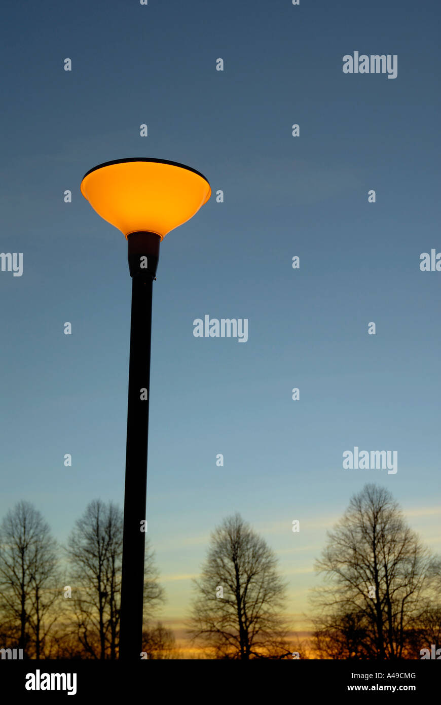 Yellow lamp at blue sky Stock Photo - Alamy