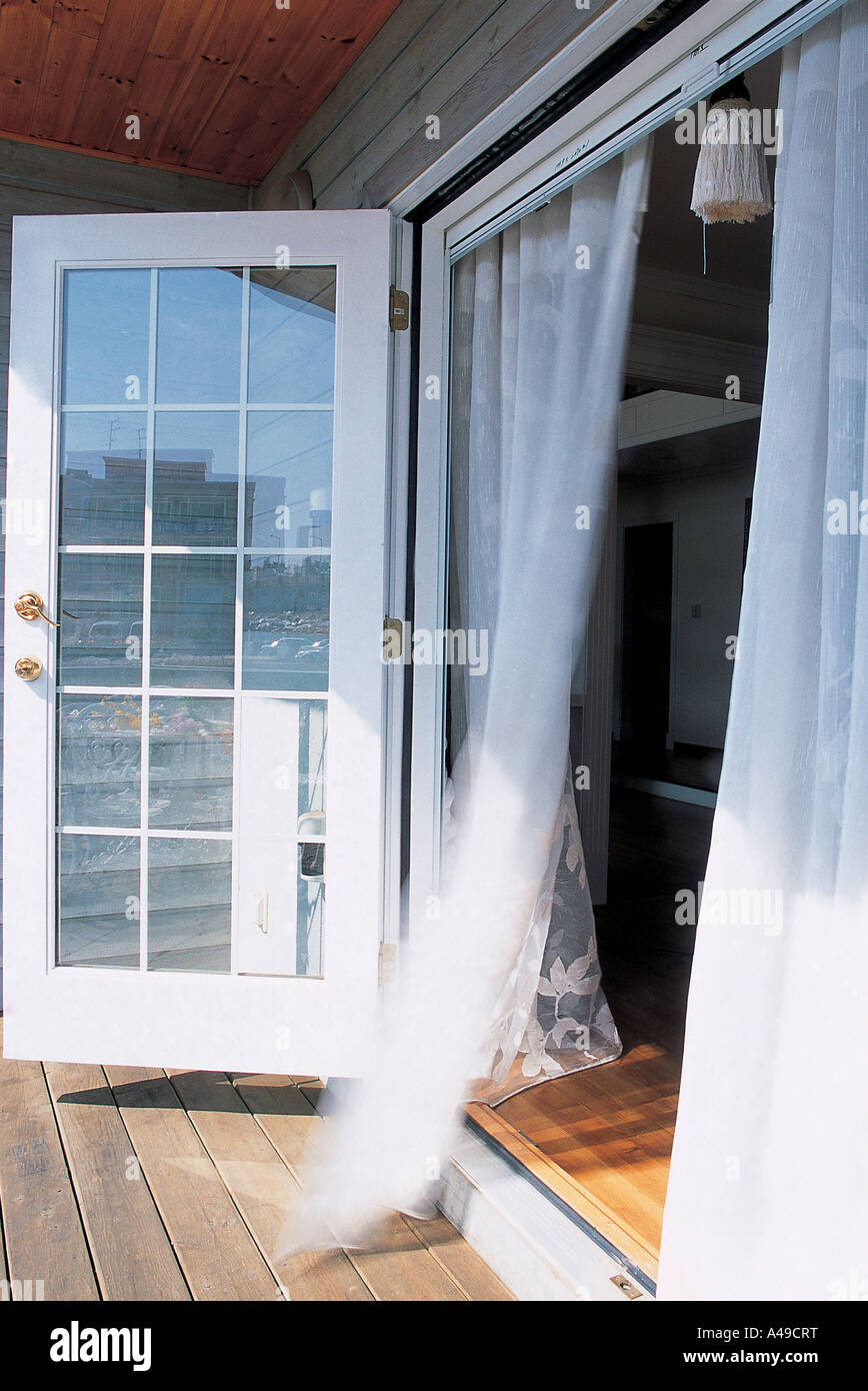 Open door in front of a house Stock Photo - Alamy