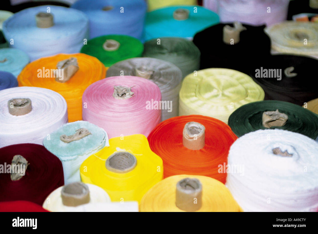 High angle view of spools of thread Stock Photo - Alamy