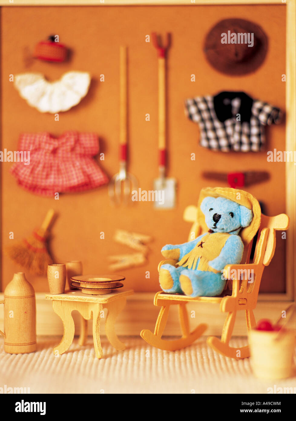 Teddy bear sitting on a rocking chair Stock Photo - Alamy