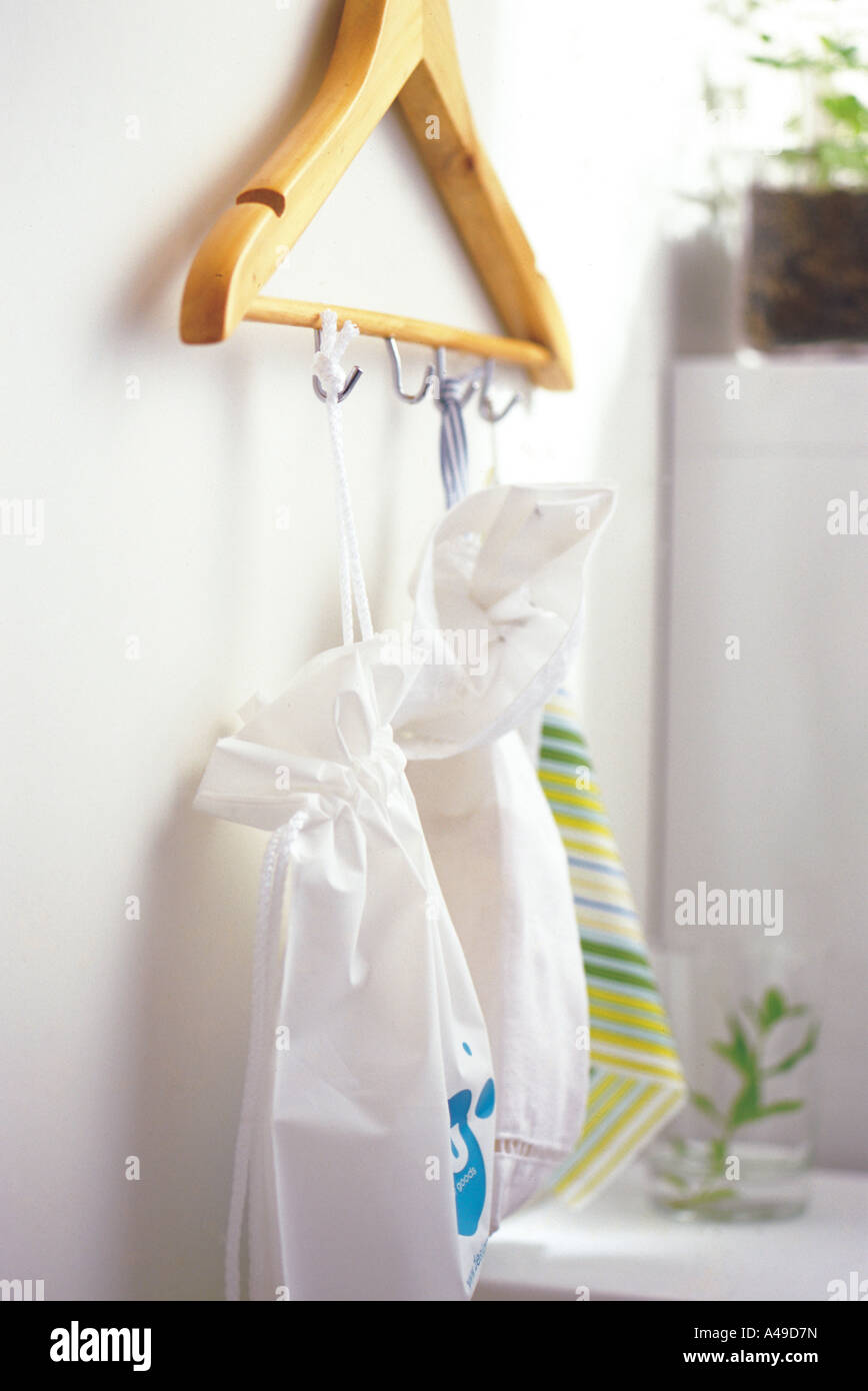 Bags on a hanger hi-res stock photography and images - Alamy