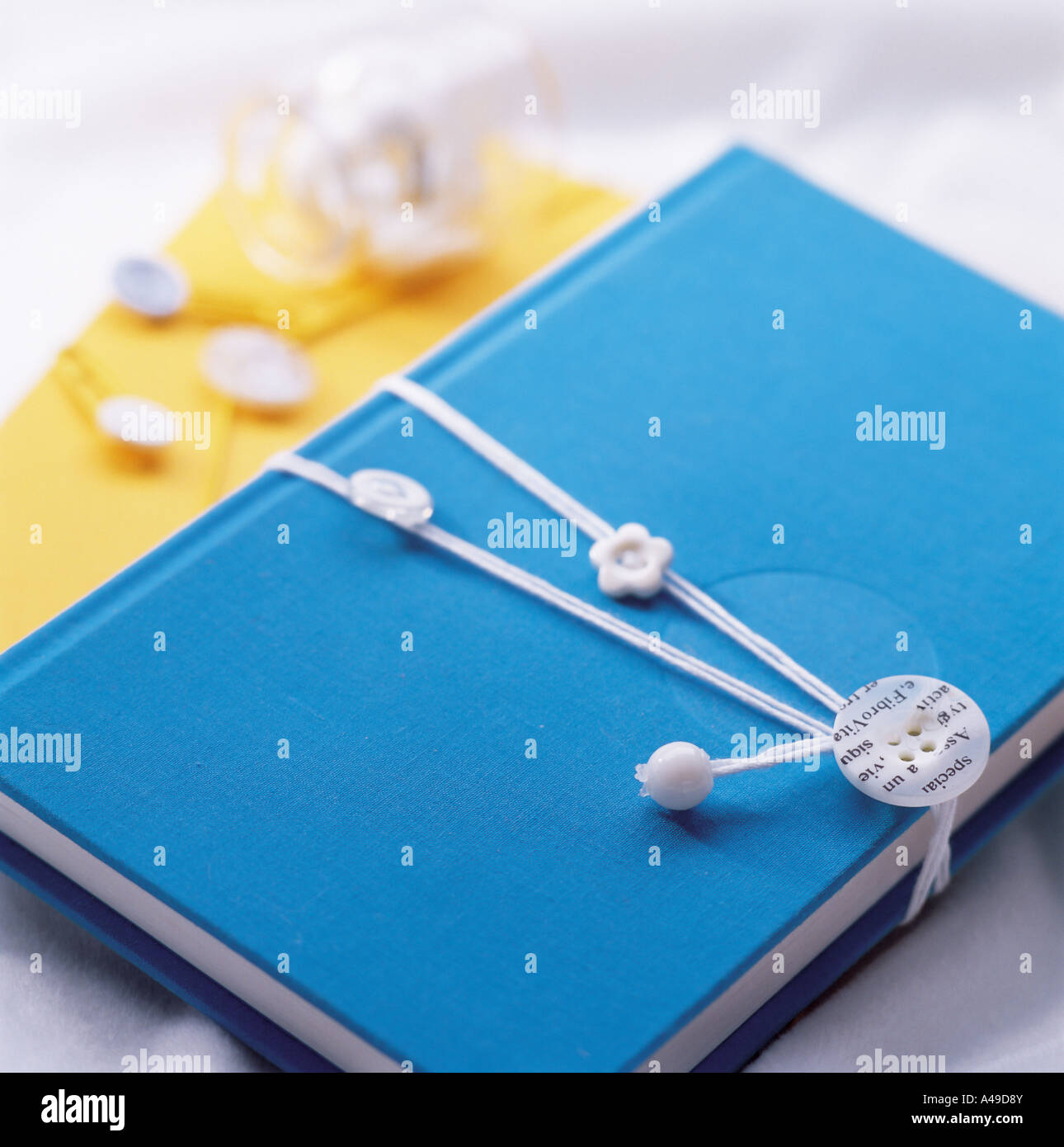 Close-up of a book tied with string Stock Photo - Alamy