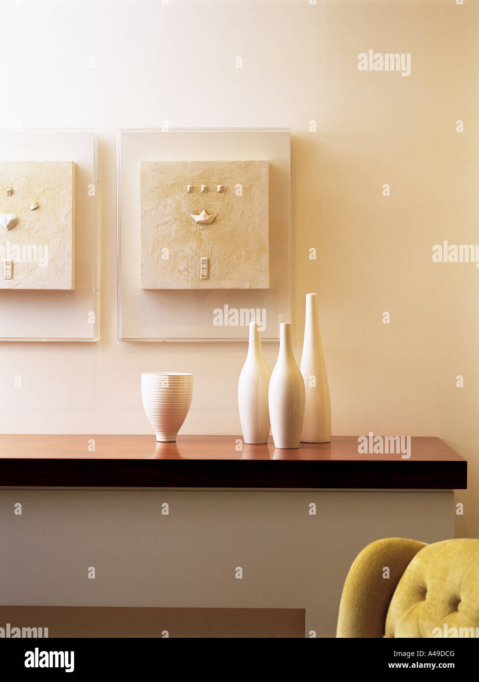 Three vases on a mantelpiece Stock Photo - Alamy