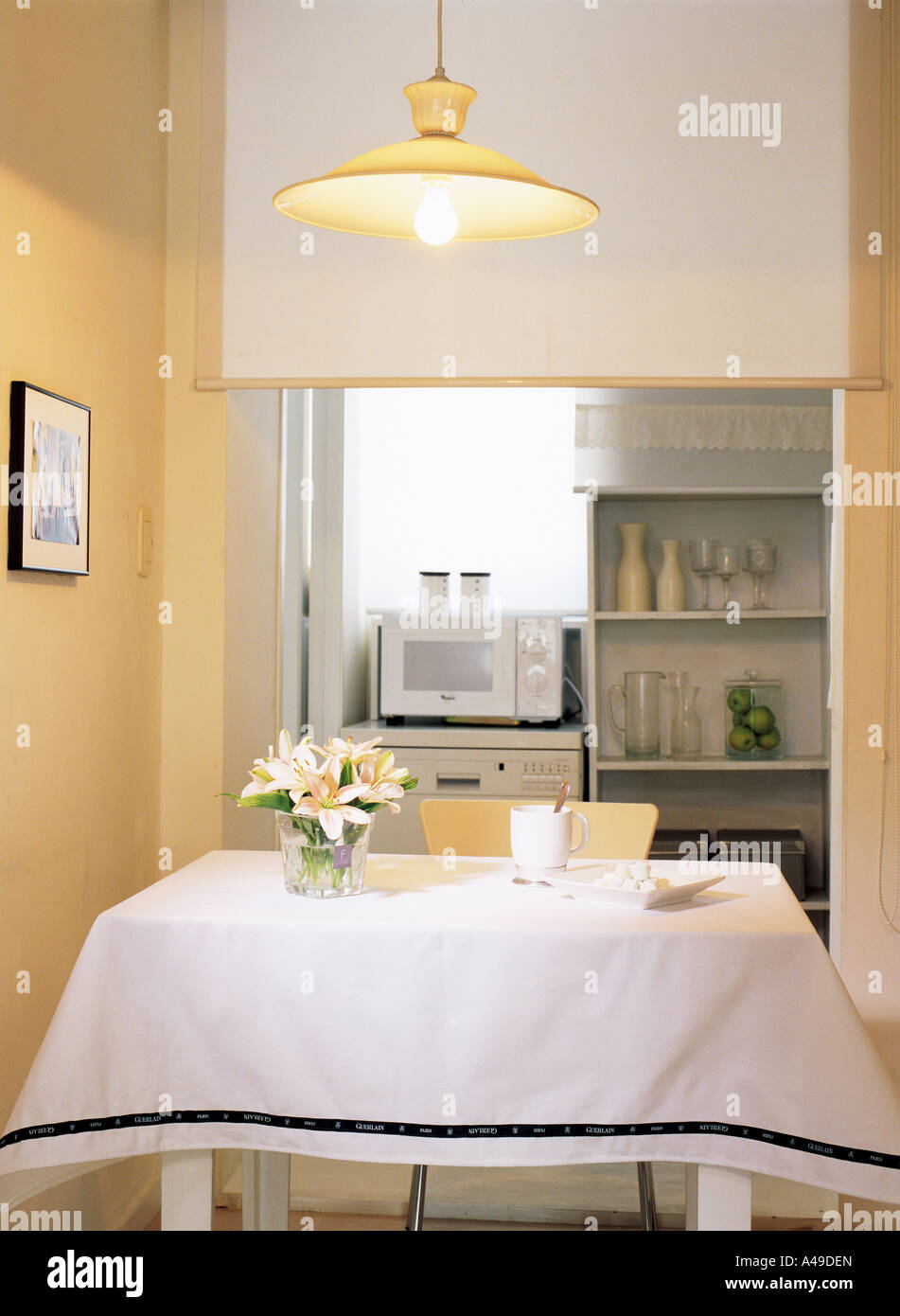 Empty chair and a table in the kitchen Stock Photo - Alamy