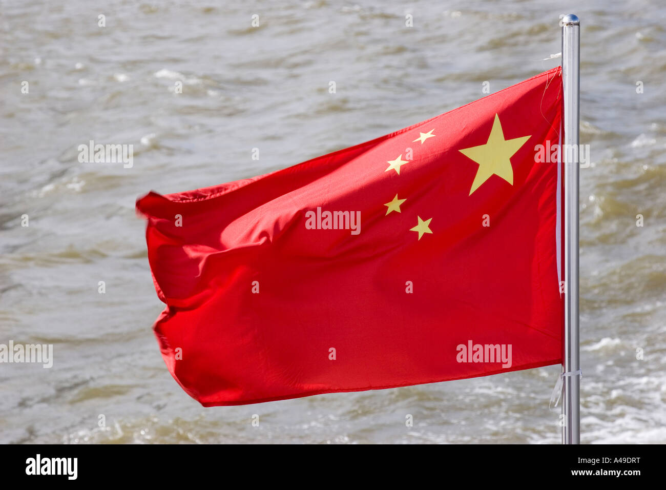 Chinese Flag over water Stock Photo - Alamy