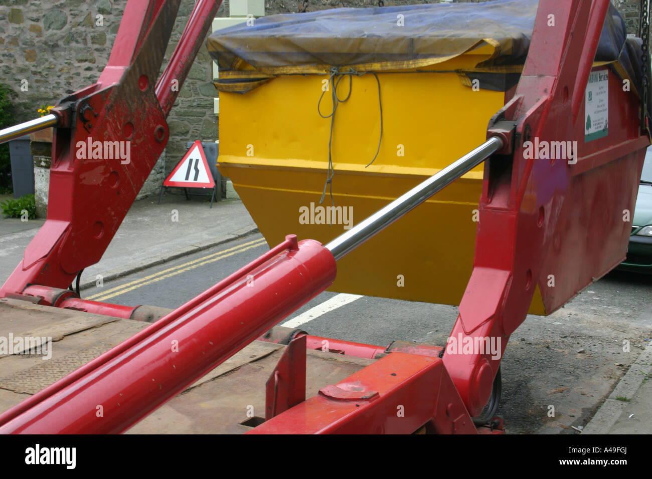 Rubbish waste skip on back of lorry Stock Photo - Alamy