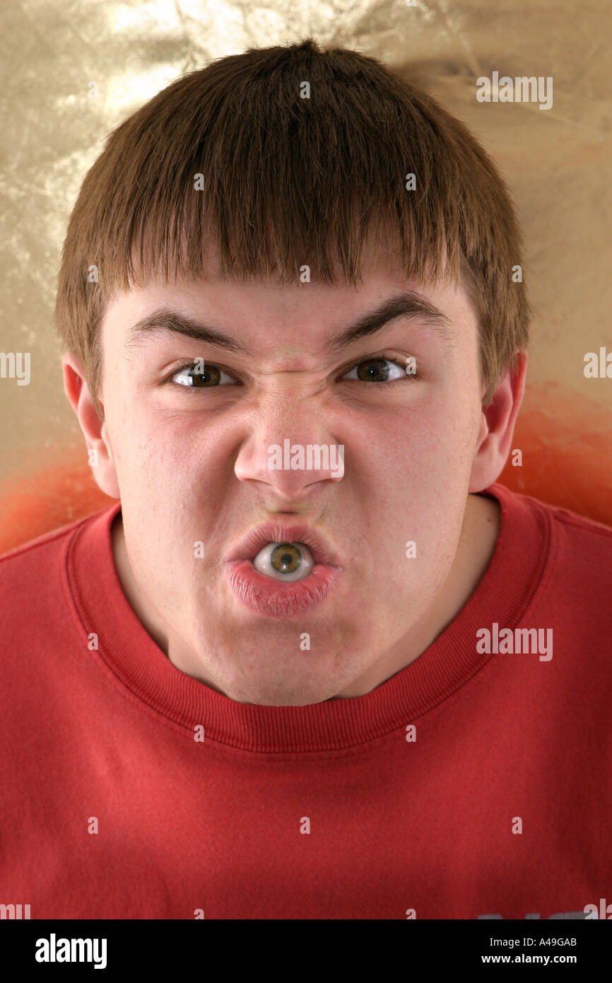 Teen Face with Eyeball in Mouth Stock Photo - Alamy