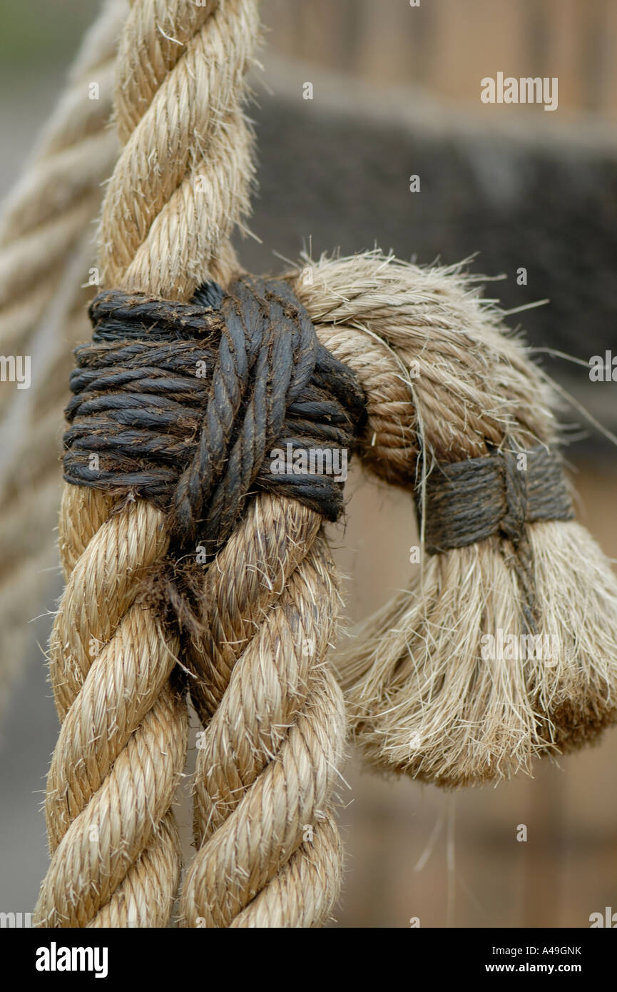 The end of a natural fibre rope whipped and bound with tarred twine ...
