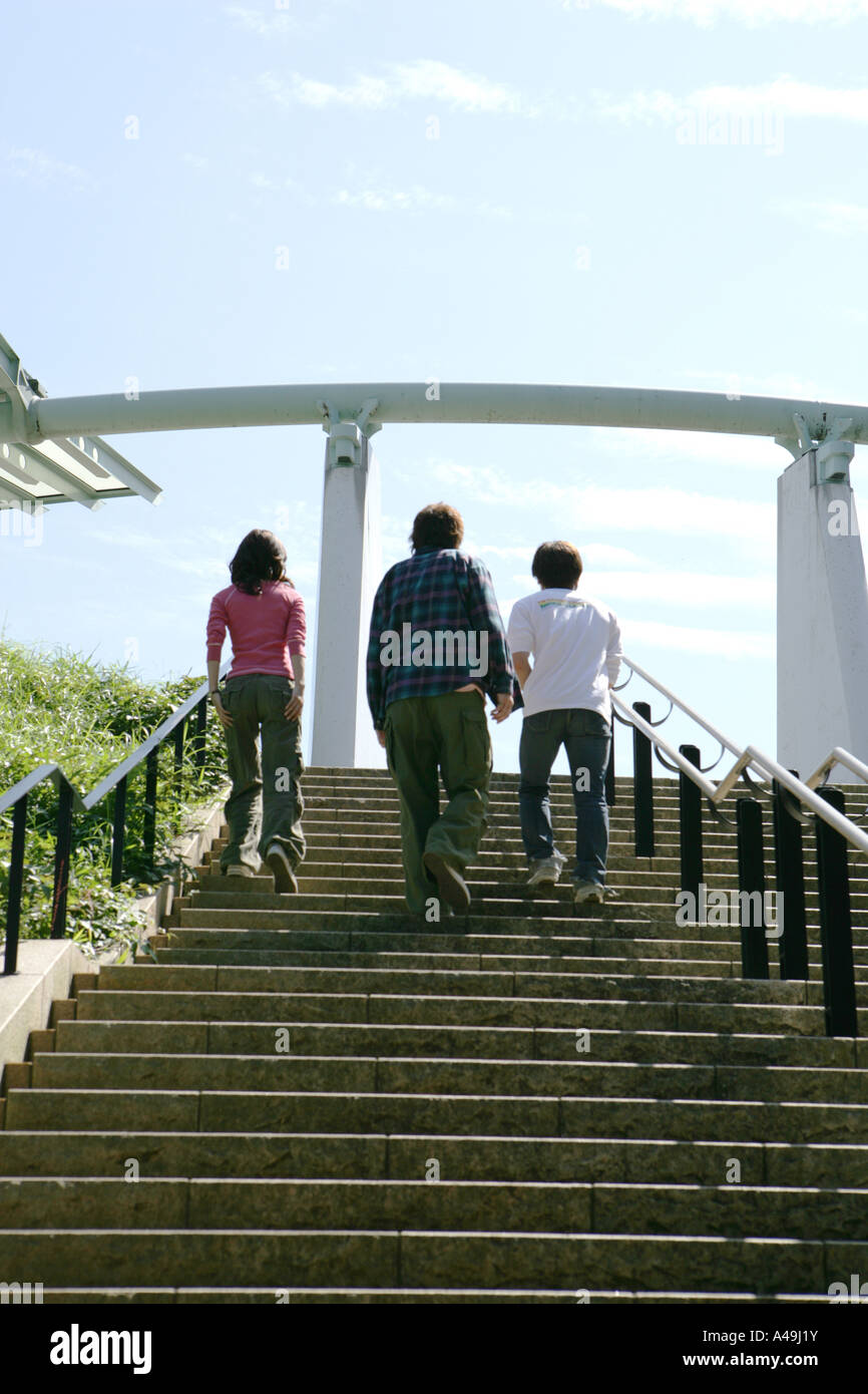 Walking up stairs three hi-res stock photography and images - Alamy
